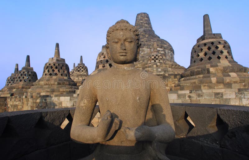 Buddha in Borobudur Temple at Sunrise. Indonesia. Stock Image - Image ...