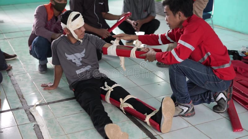 First Aid Training for Broken Legs Stock Video - Video of industrial ...