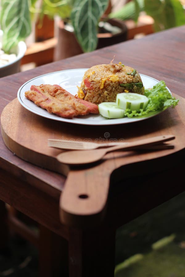 Indonesia Traditional Spicy Fried Rice with Fried Chicken Stock Photo ...