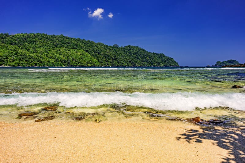 Indonesian beach stock photo. Image of blue, green, resort - 100583090
