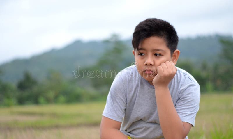 Indonesian Boy with Sad Expression. Stock Image - Image of asia ...