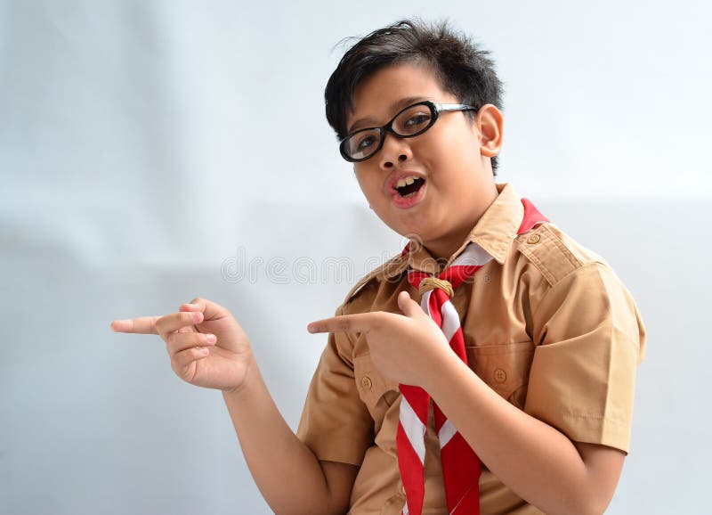 Indonesian Boy Scouts with Point Direction Expressions Stock Image ...