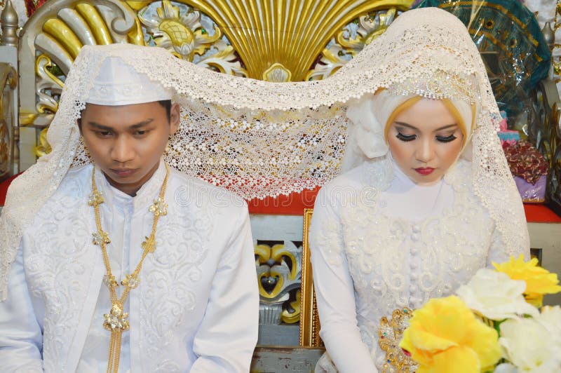 Indonesian bridal couples stock photo. Image of asian - 52075978