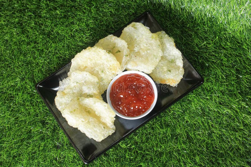 Indonesian Cireng with Spicy Chili Sauce on Grass Background. Crispy ...