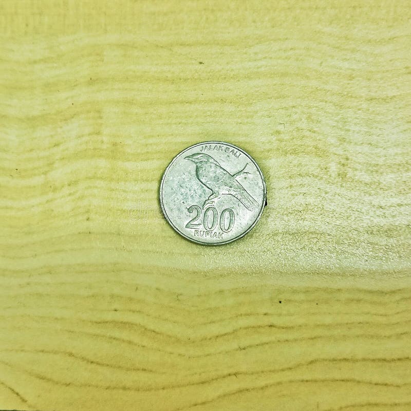 Indonesian Coins Worth 200 Rupiah with a Bird Image Stock Photo - Image ...