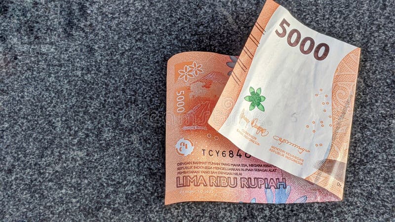 Indonesian Currency in 5000 Rupiah Stock Image - Image of cash ...