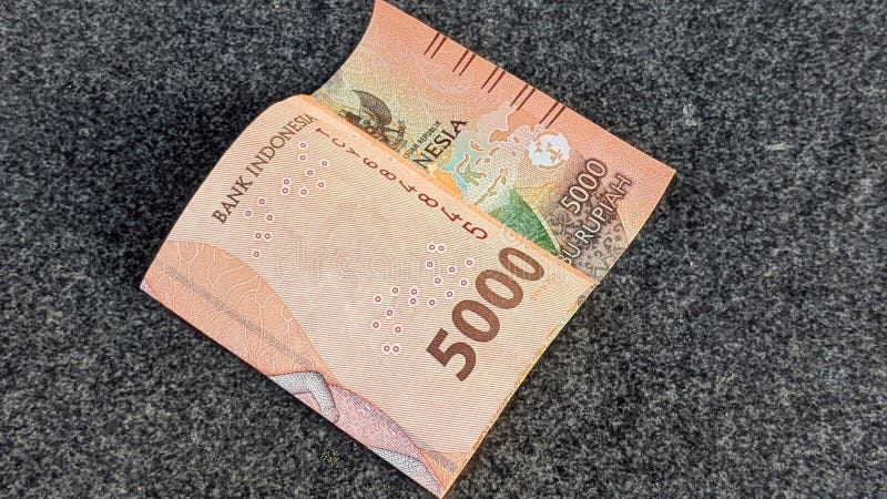 Indonesian Currency in 5000 Rupiah Stock Photo - Image of trade, paper ...