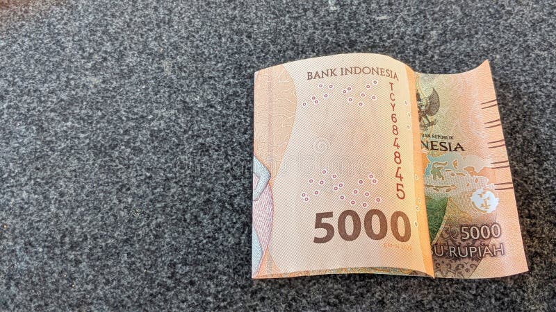 Indonesian Currency in 5000 Rupiah Stock Photo - Image of savings ...