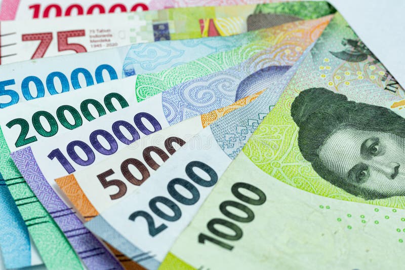 Indonesian Currency. Stack of Rupiah or IDR Banknotes Inside White ...