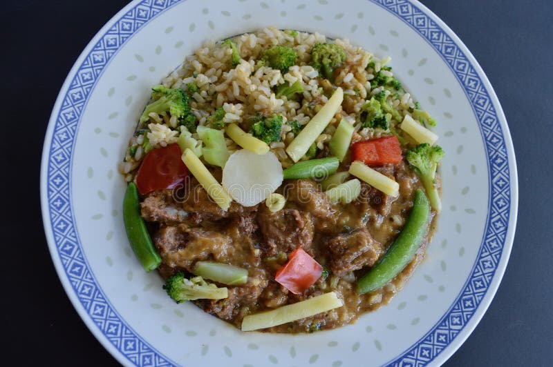 Beef Rendang with Vegetables and Rice Stock Photo - Image of indonesia ...