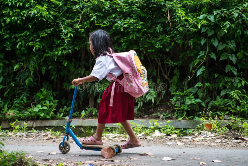 Indonesian Elementary Student Ride Stunt Scooter Editorial Photo ...