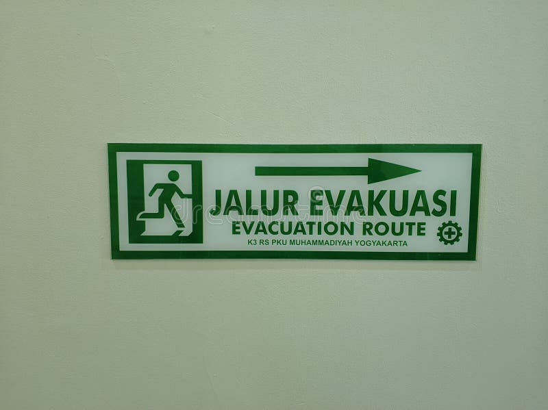 Indonesian Evacuation Sign Attached To the Wall Stock Image - Image of ...