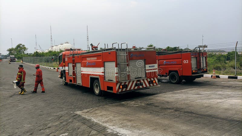 Indonesian Firefighter editorial stock photo. Image of asphalt - 262401858