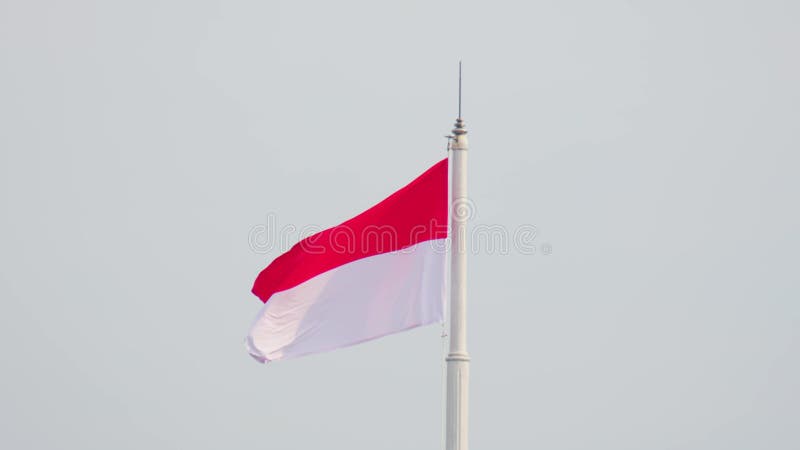 Indonesian Flag Waving on Flagpole Stock Footage - Video of unity ...