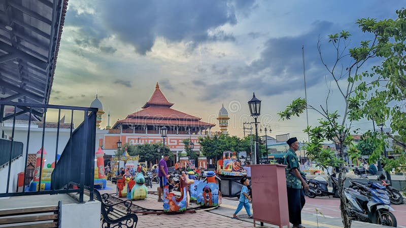 Indonesian park in evening editorial photo. Image of sunset - 303013211