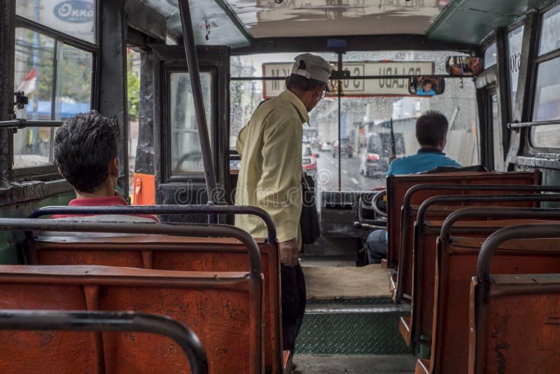 Indonesian Passengers Commute in an Old Empty Bus in Jakarta, Indonesia ...