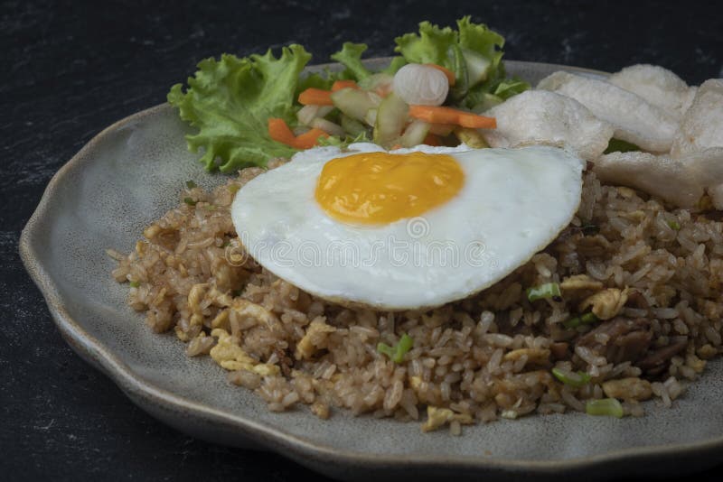 Indonesian Style of Fried Rice with Egg and Crackers Stock Image ...