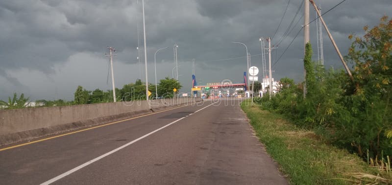 Indonesian toll road stock image. Image of rain, road - 266004107