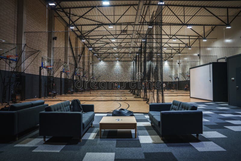 Indoor Basketball Facility with Multiple Courts and Seating Area Stock ...