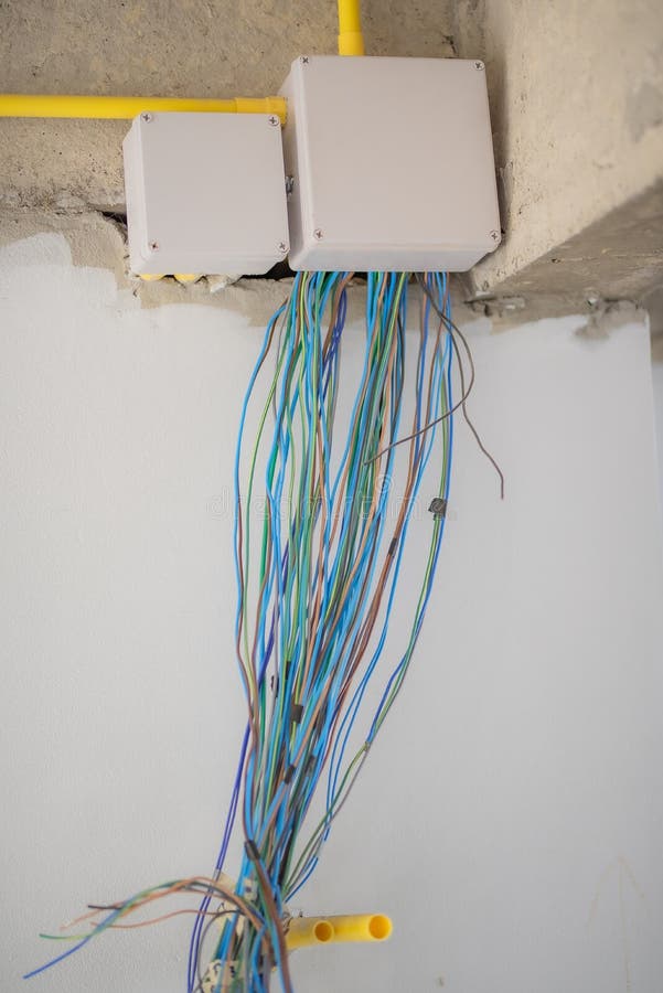 Socket Back Boxes with Wires in a Wall. Cabling Background. Colorful ...