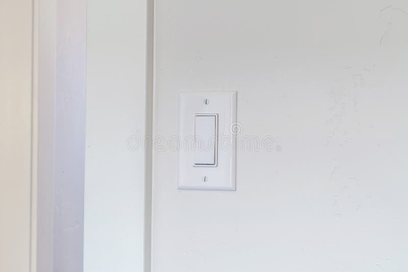 Indoor Electrical Light Switch of Home Mounted on White Wall Background ...