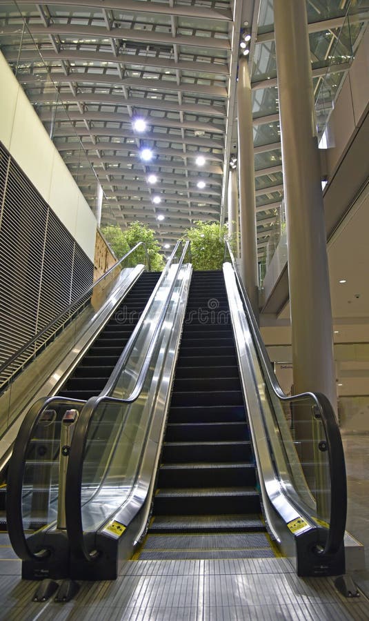 Escalator View from Side with Tiled Wall Stock Photo - Image of black ...
