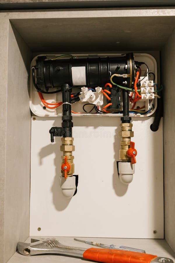 Indoor Heating System Maintenance with Tools and Pipes Stock Photo ...