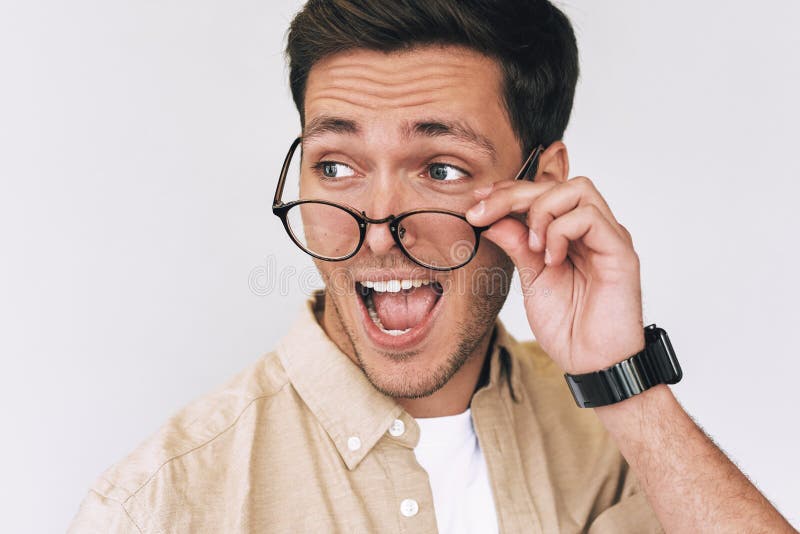 Indoor Image Of Amazed Excited Young Man Doesn`t Believe His Success