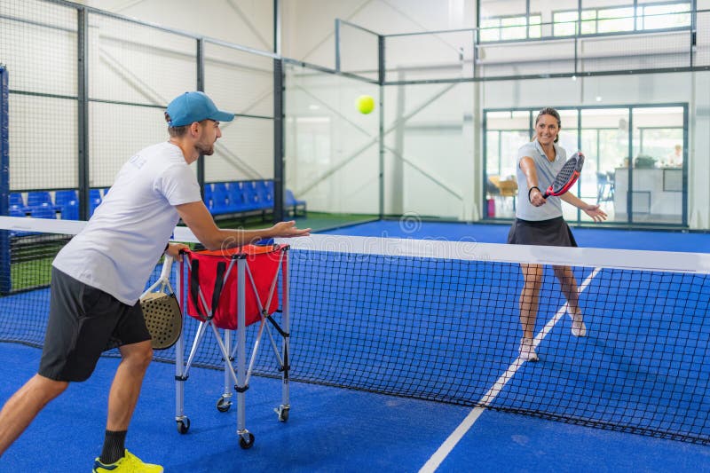 Indoor Padel Training: Coach and Female Player Techniques Stock Photo ...