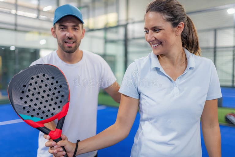 Indoor Padel Training. Trainer and Woman Improving Her Techniques Stock ...