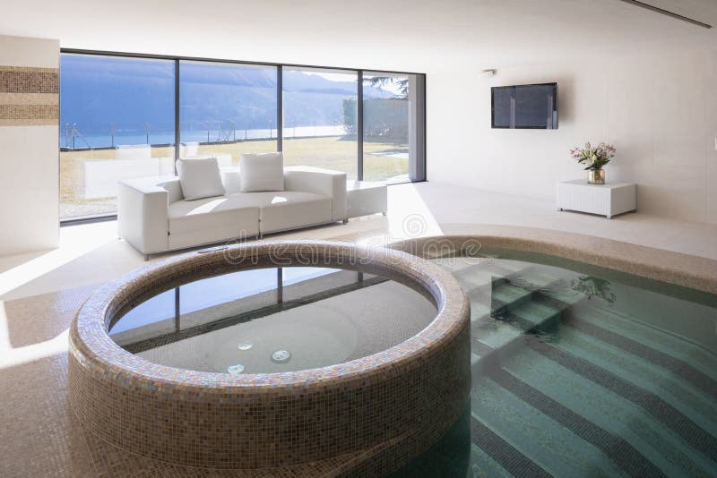 Indoor Pool of Private Villa with Lake View and Bar Area Stock Photo ...