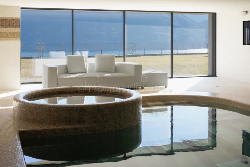 Indoor Pool of Private Villa with Lake View and Bar Area Stock Photo ...