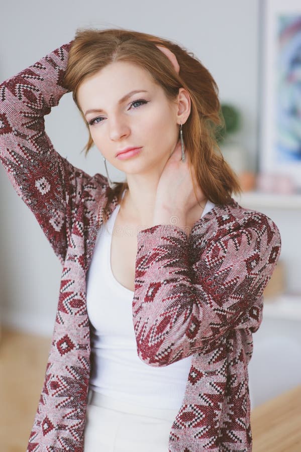 Indoor Portrait of Beautiful Young Woman Posing at Home in Warm Cozy ... Indoor Portrait of Beautiful Young Woman Posing at Home in Warm Cozy ...