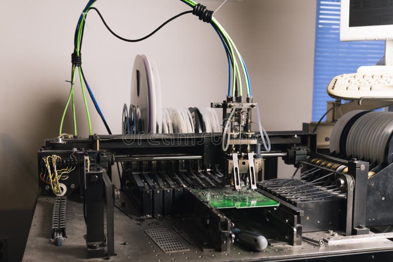 Indoor Shot of a SMD Mounting Machine Used by an Engineer To Connect ...