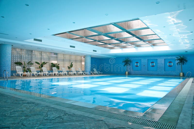 Indoor swimming pool stock image. Image of resort, interior - 12064675