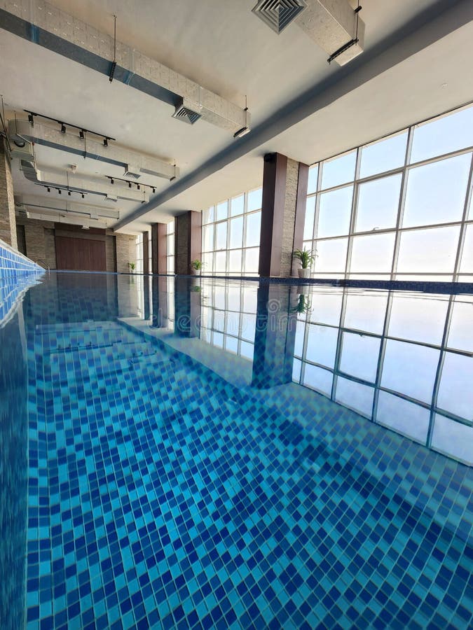 Indoor swimming pool stock photo. Image of wall, design - 249170336