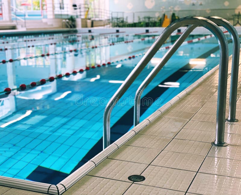 Indoor swimming pool editorial photography. Image of indoor - 297399927