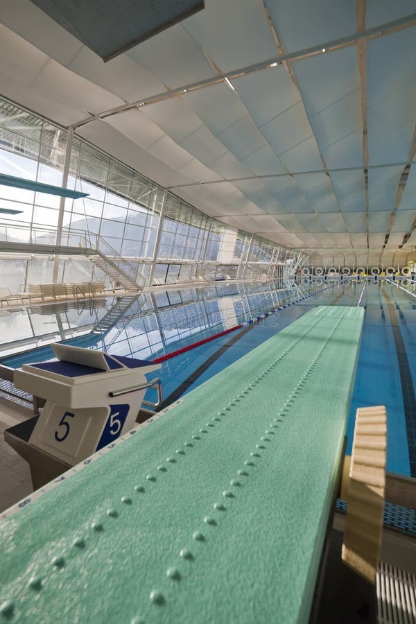 Indoor Swimming Pool with Spring Board Stock Image - Image of holiday ...