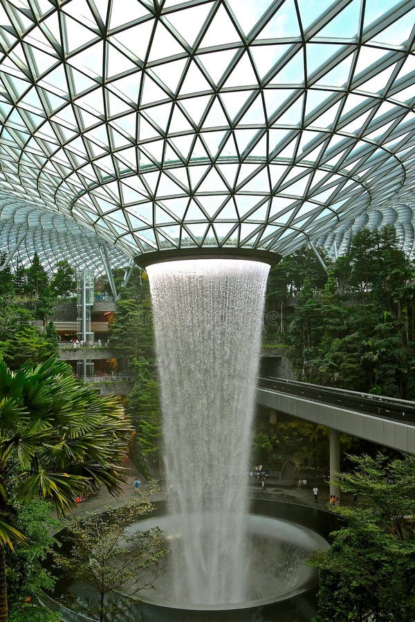 Indoor tropical garden stock image. Image of fountain - 157795143