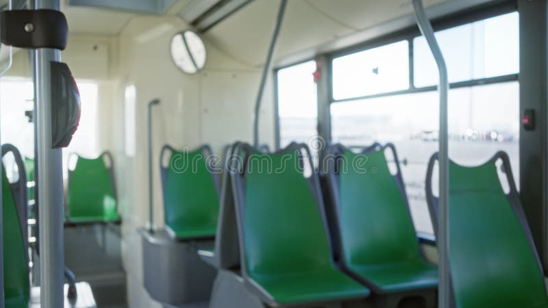 Indoor View of Empty Bus Interior with Green Seats and Bright Light ...
