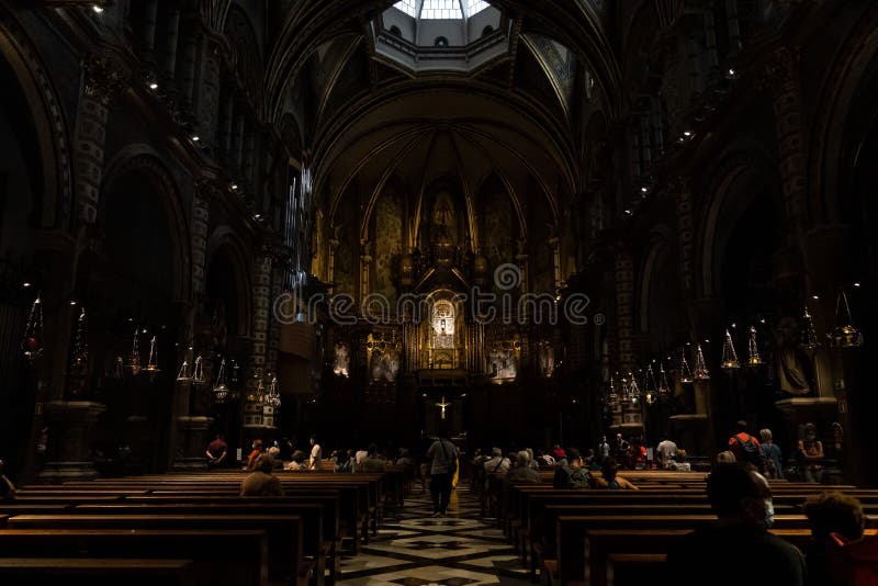 Indoors in the Dark Catholic Temple in Zaragoza, Spain Editorial ...