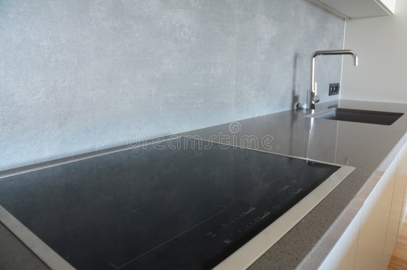 An Induction Cooktop on the Modern Kitchen. Induction Cooking View ...