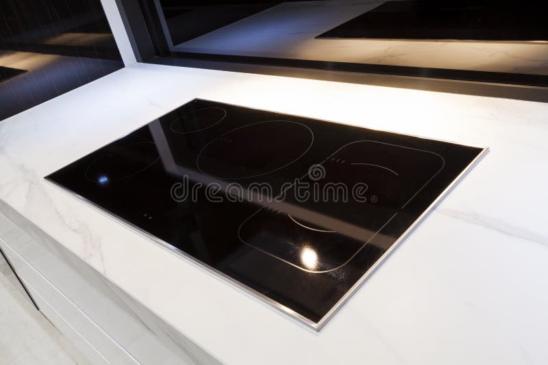 Induction cooktop stock image. Image of steel, domestic - 68830375