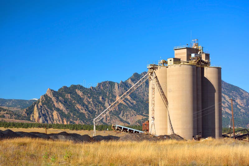 Industrial Agriculture Elevator Silo with Mountains Stock Photo - Image ...