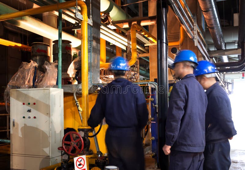 Factory Worker Carrying Bottles of Chemicals Stock Photo - Image of ...