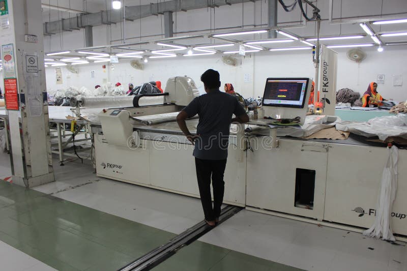 Automated Fabric Cutting Machine in Operation at a Manufacturing ...