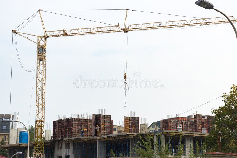 Industrial Background Made of Crane Construction at the Buildings ...