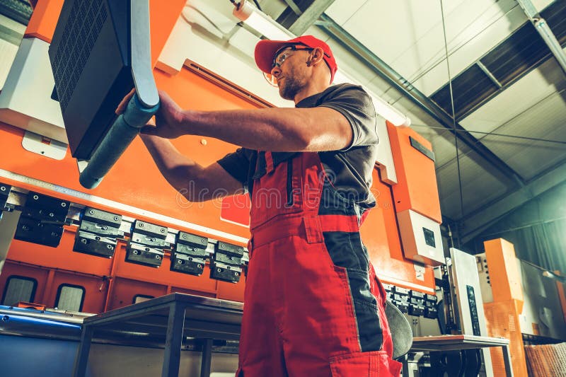 Industrial Bending Machine Operator at Work Stock Photo - Image of ...