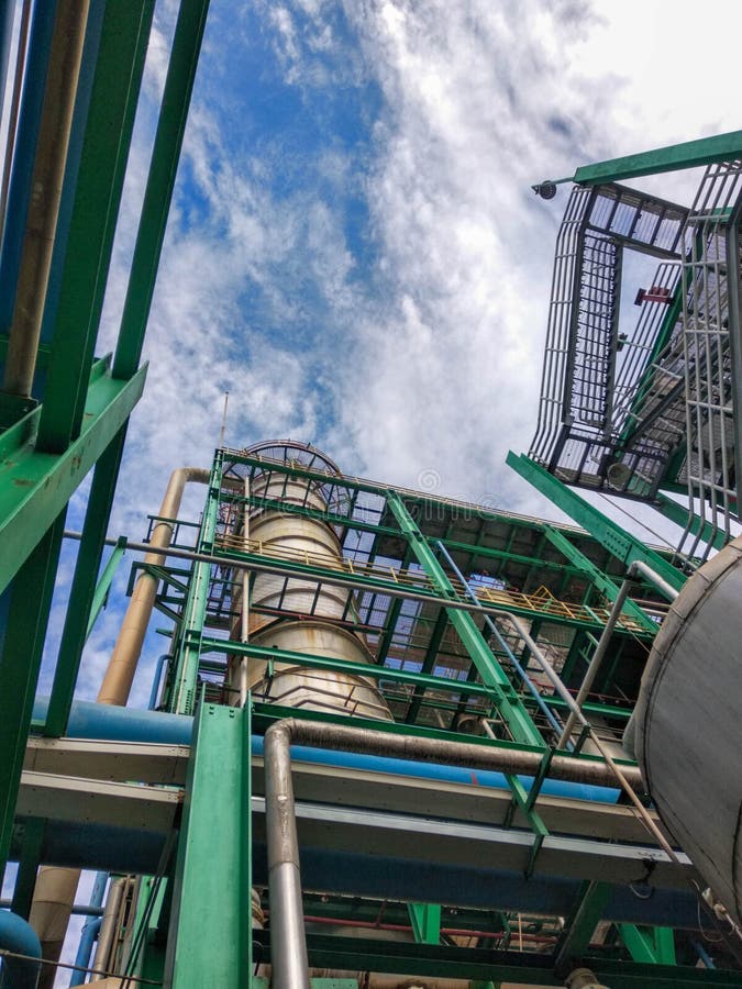 An Industrial Building. Distillation Column Stock Image - Image of pipe ...