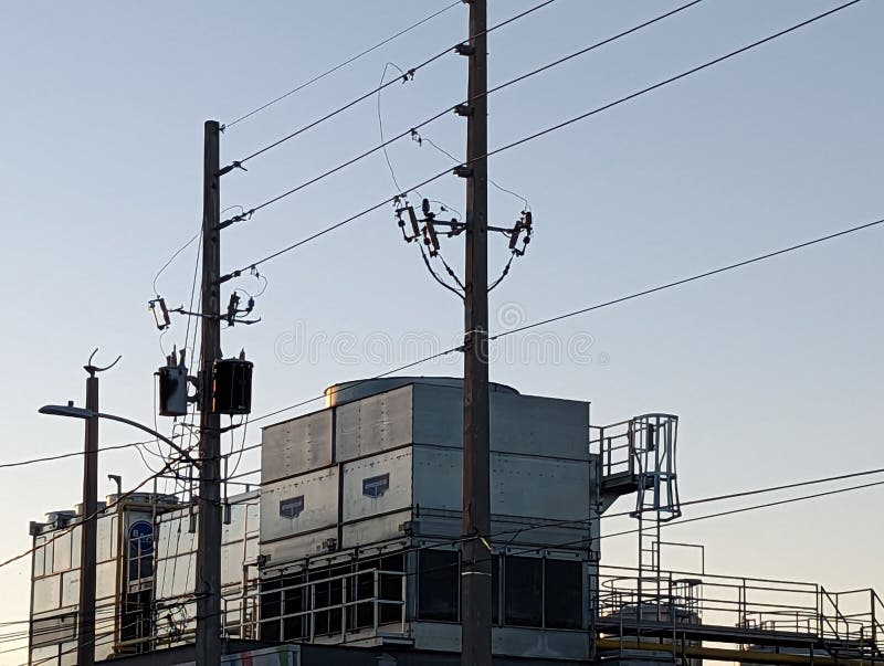Industrial Building with Power Lines Stock Photo - Image of iron, lines ...